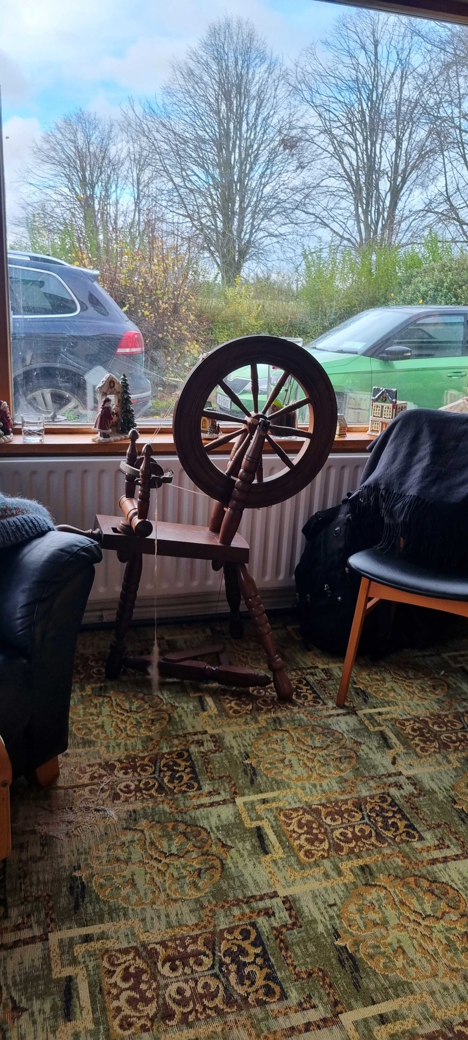 b. another traditional spinning wheel – Felting and Fiber Studio
